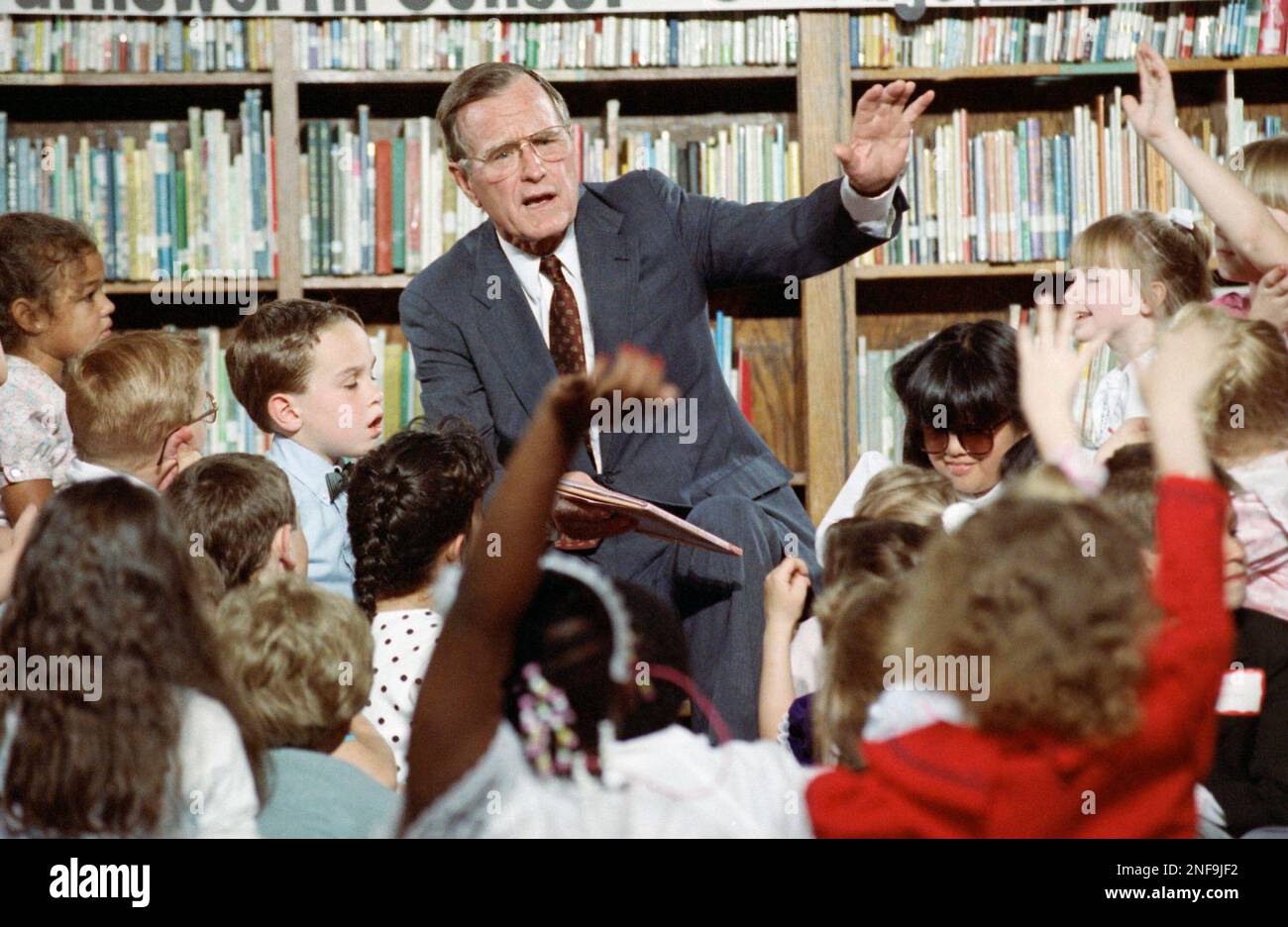 President George Bush waits to answer a question from a student at ...