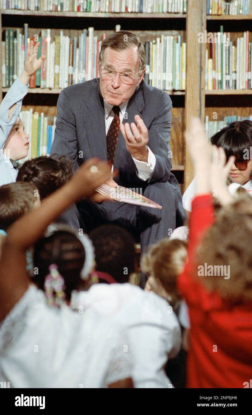 President George Bush waits to answer a question from a student at ...