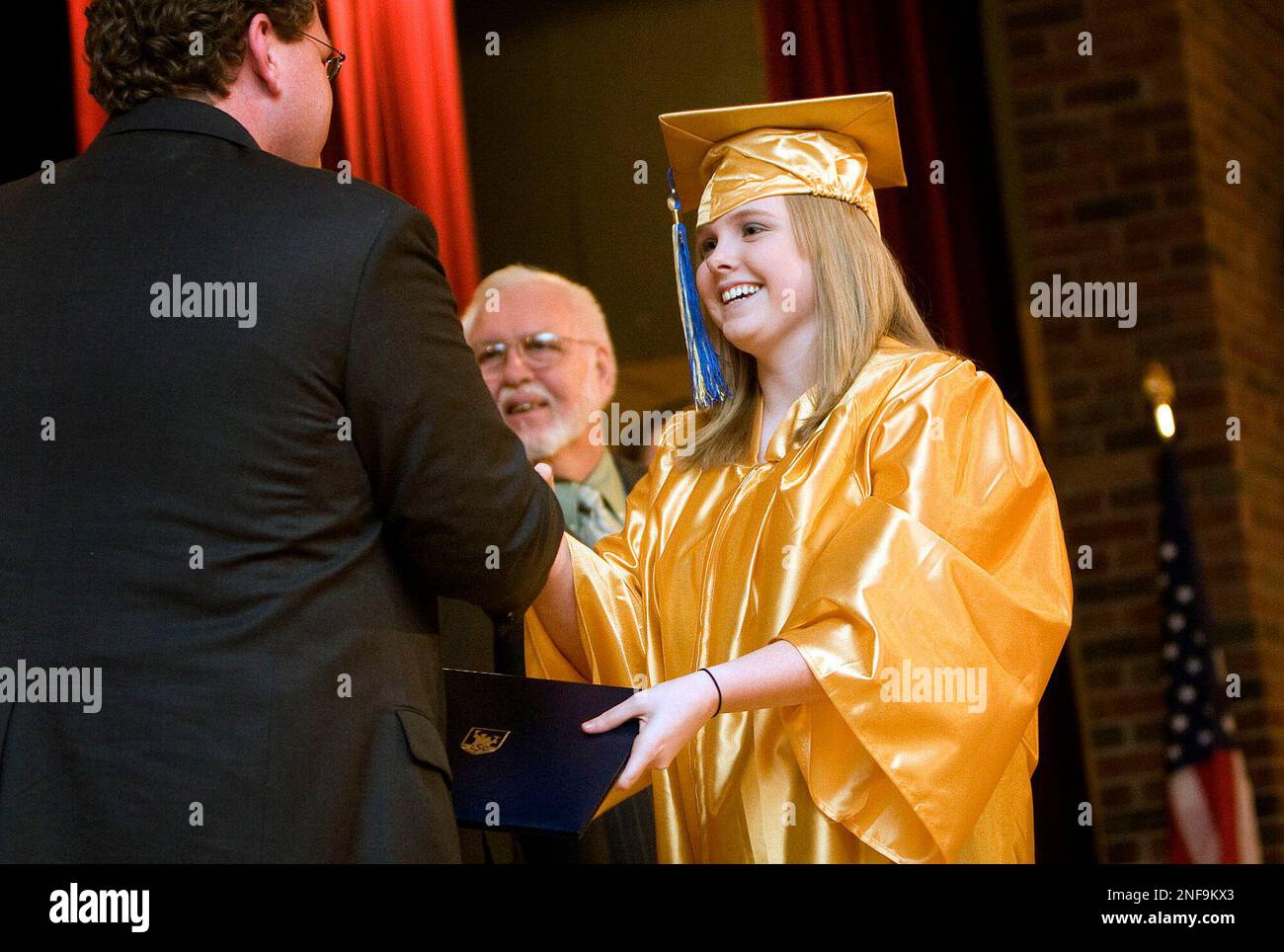 Kayla Young receives her diploma during the Life Skills Center ...