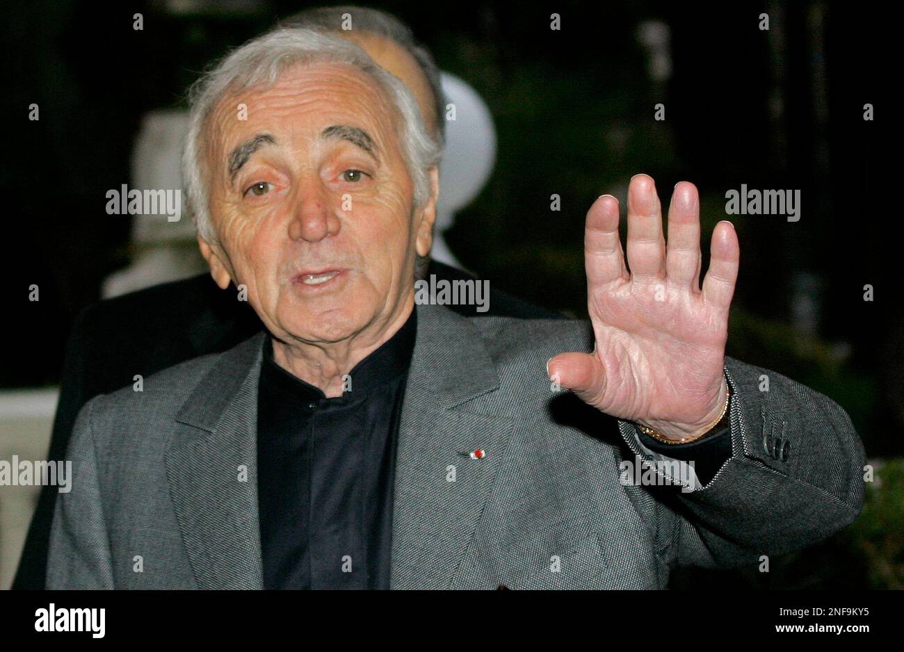 French singer Charles Aznavour poses for a photocall during the 43rd ...