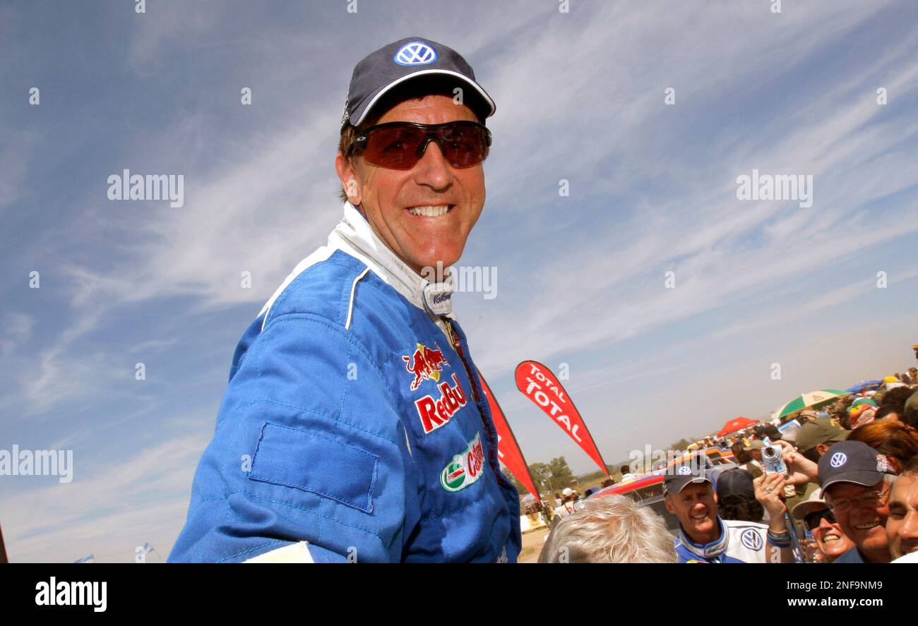 Volkswagen driver Mark Miller of the US smiles after finishing second ...