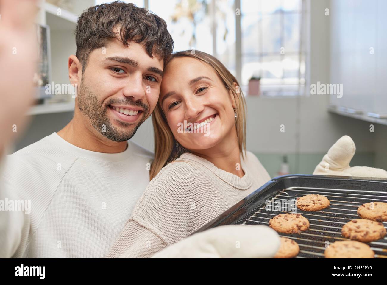 Kitchen, selfie and couple baking cookies together for love, bonding ...