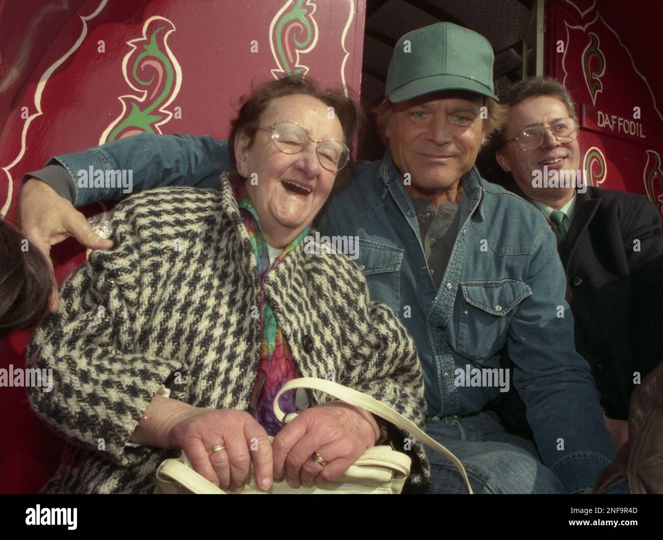 U.S. American actor Terence Hill (Mario Girotti) puts his arm around ...