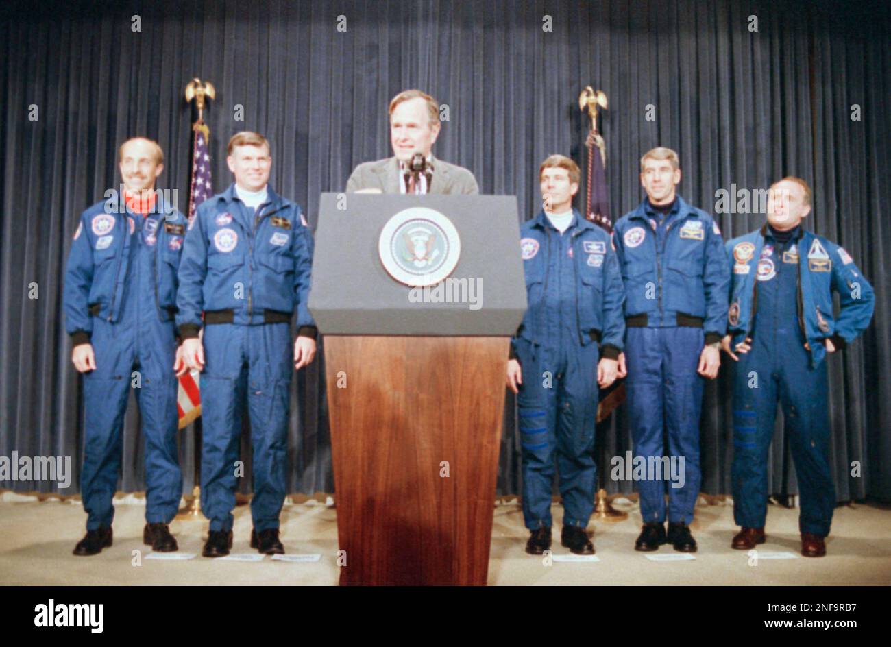 President George Bush has a visit with the astronaut crew that flew the ...