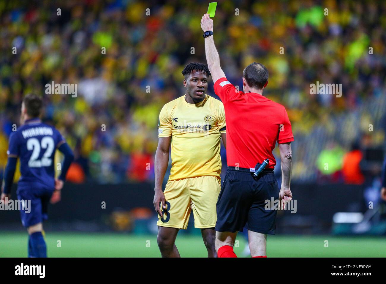 Bodø 20230216.Referee Harald Lechner gives a yellow card to Bodø/Glimt ...