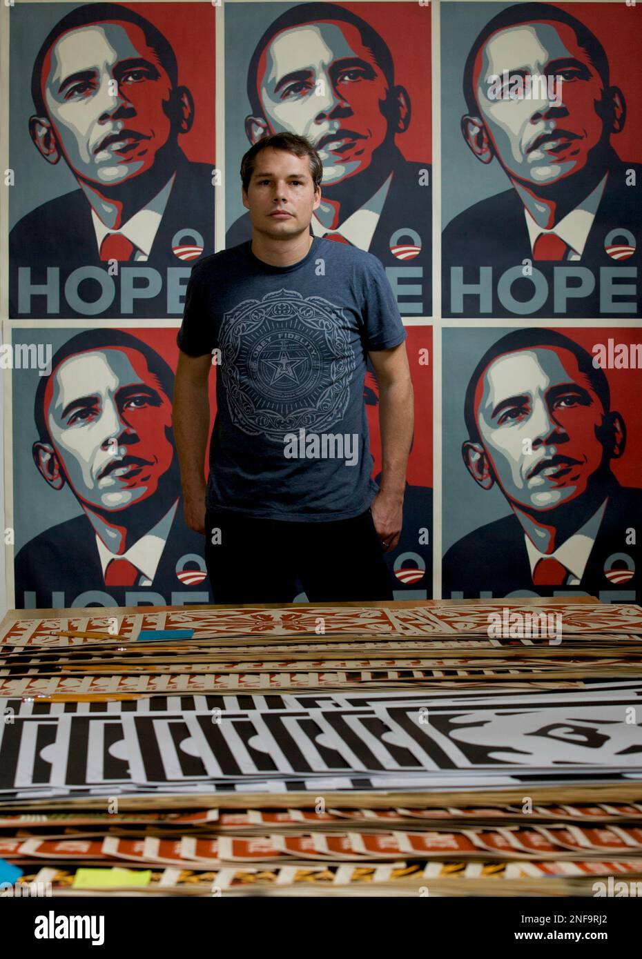 Los Angeles street artist Shepard Fairey poses for a picture with his ...