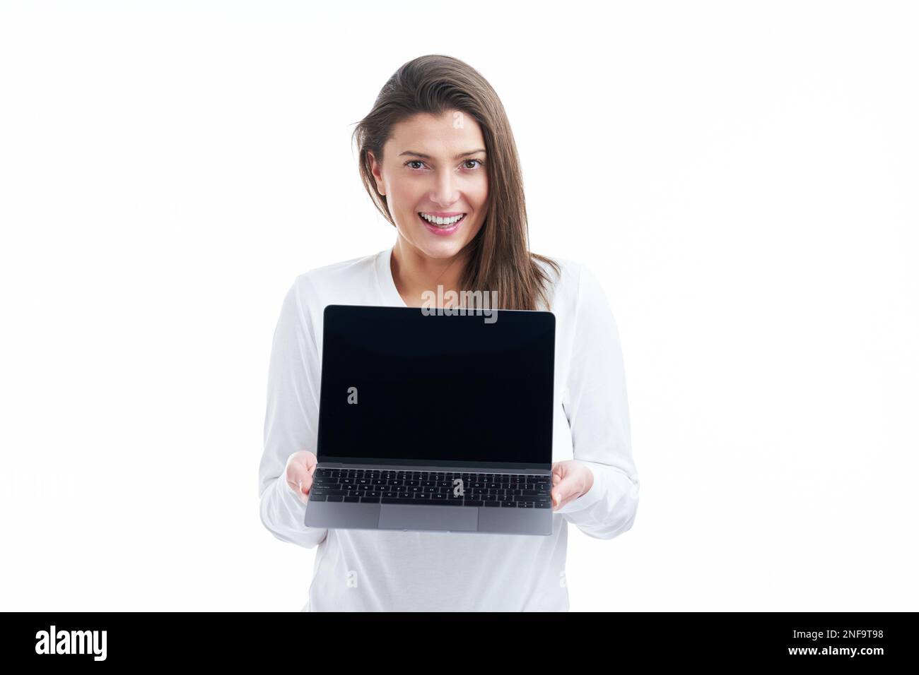 Isolated picture of brunette woman on white background with computer ...