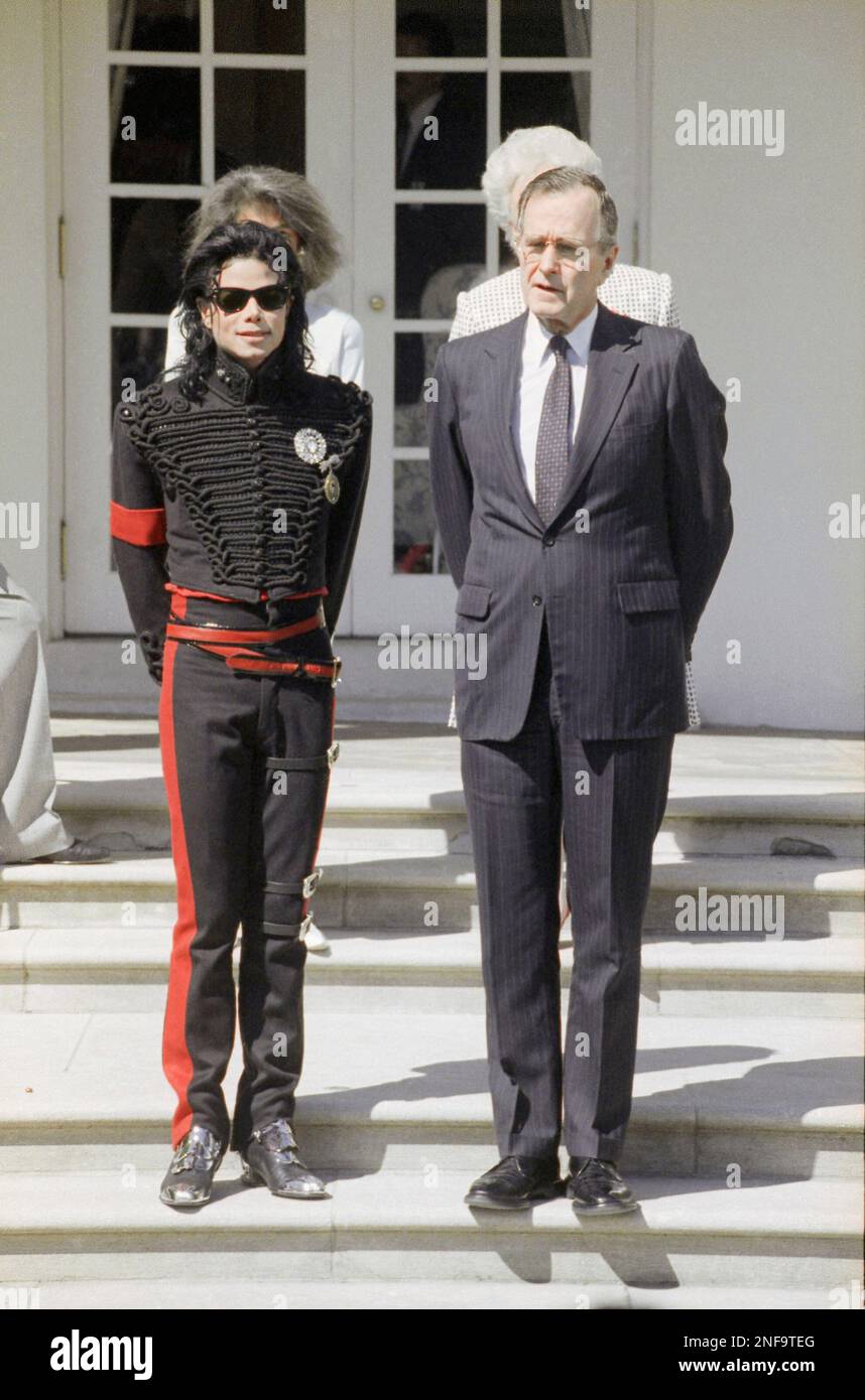 President George H.W Bush welcomes singer Michael Jackson, who was ...