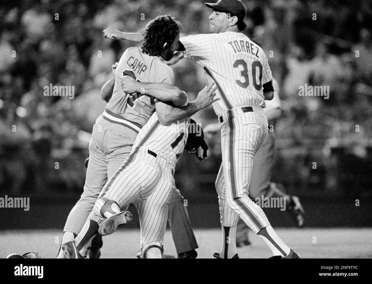 New York pitcher Mike Torrez takes a swing at Atlanta Braves' pitcher ...