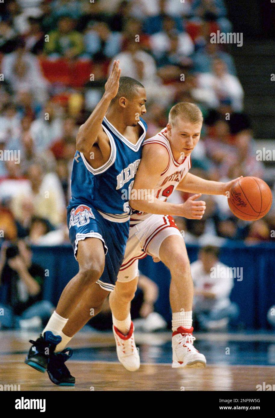 Western Kentucky’s Michael Fraliex (14) charges down the court as ...