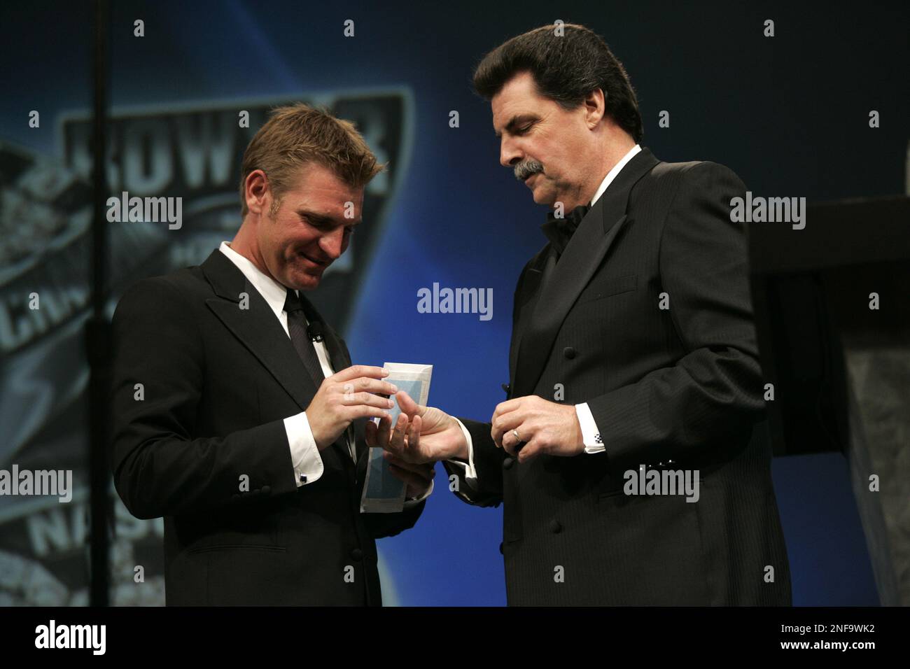Series Champion Clint Bowyer receives his award from NASCAR President ...