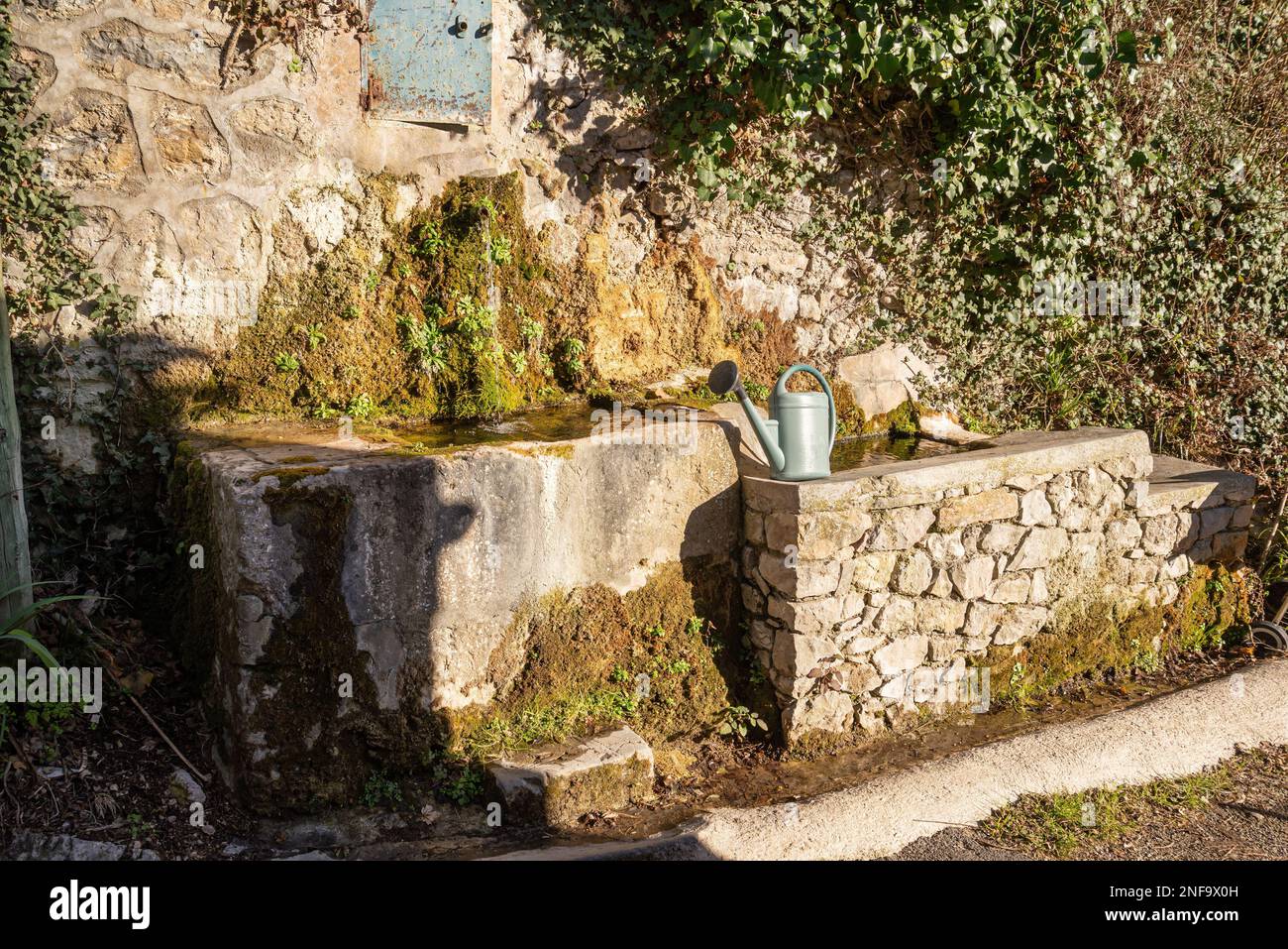 A fountain in the small town of Mazaugues in the Var department ...