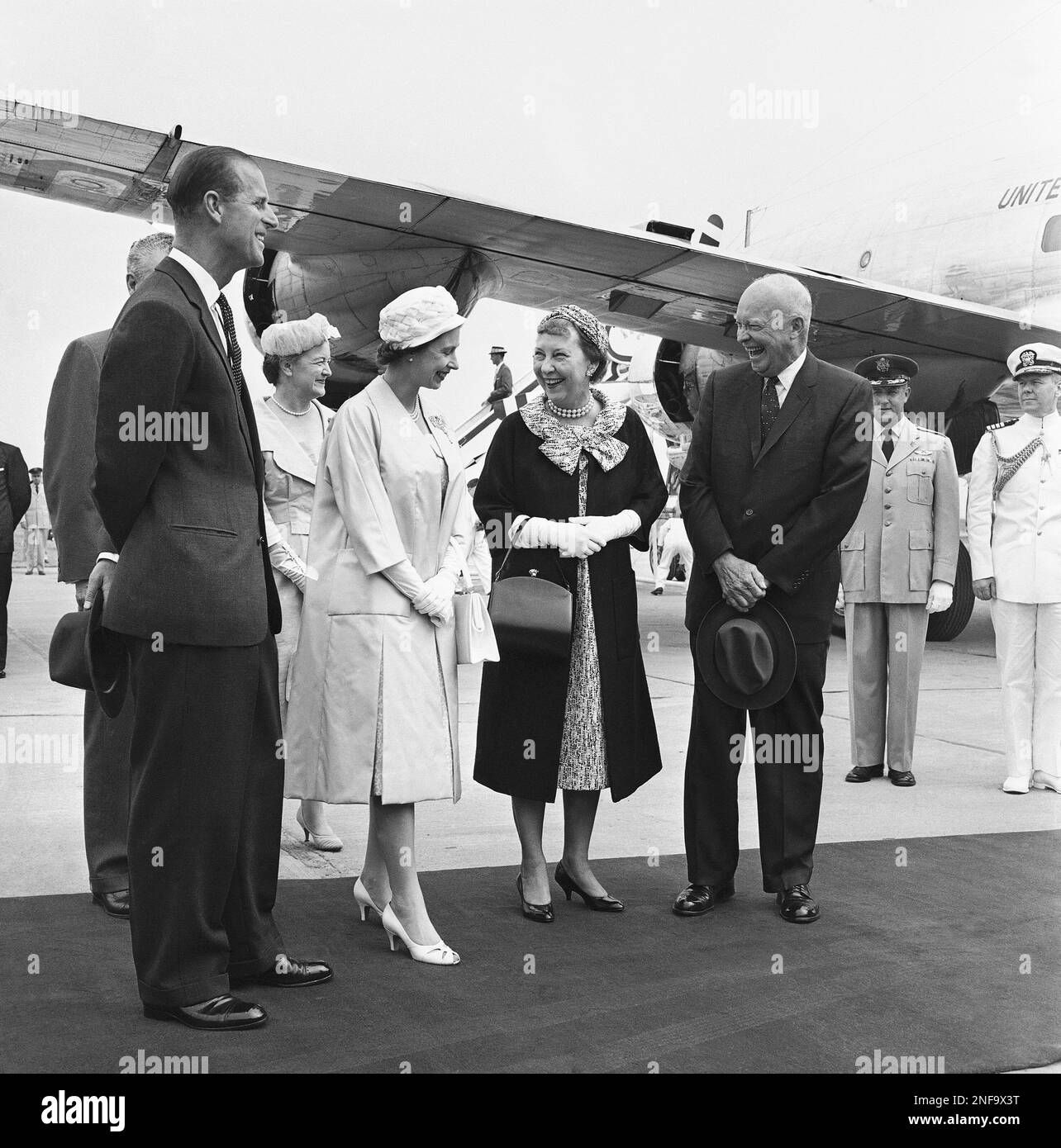U.S. President Dwight Eisenhower and first lady Mamie Eisenhower chat ...