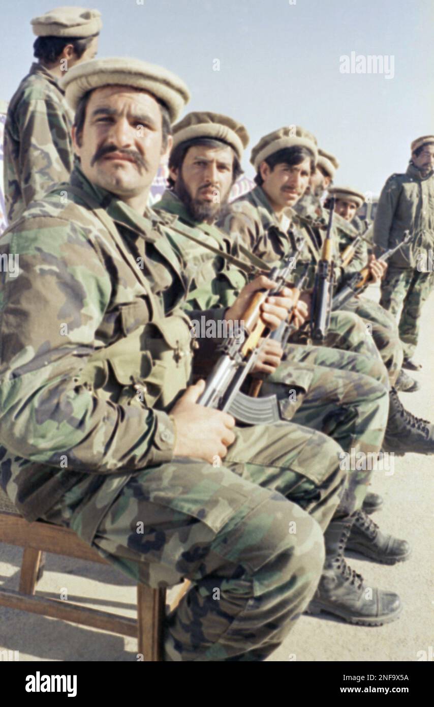 A special Afghan rebel security force armed with AK-47 rifles keep ...