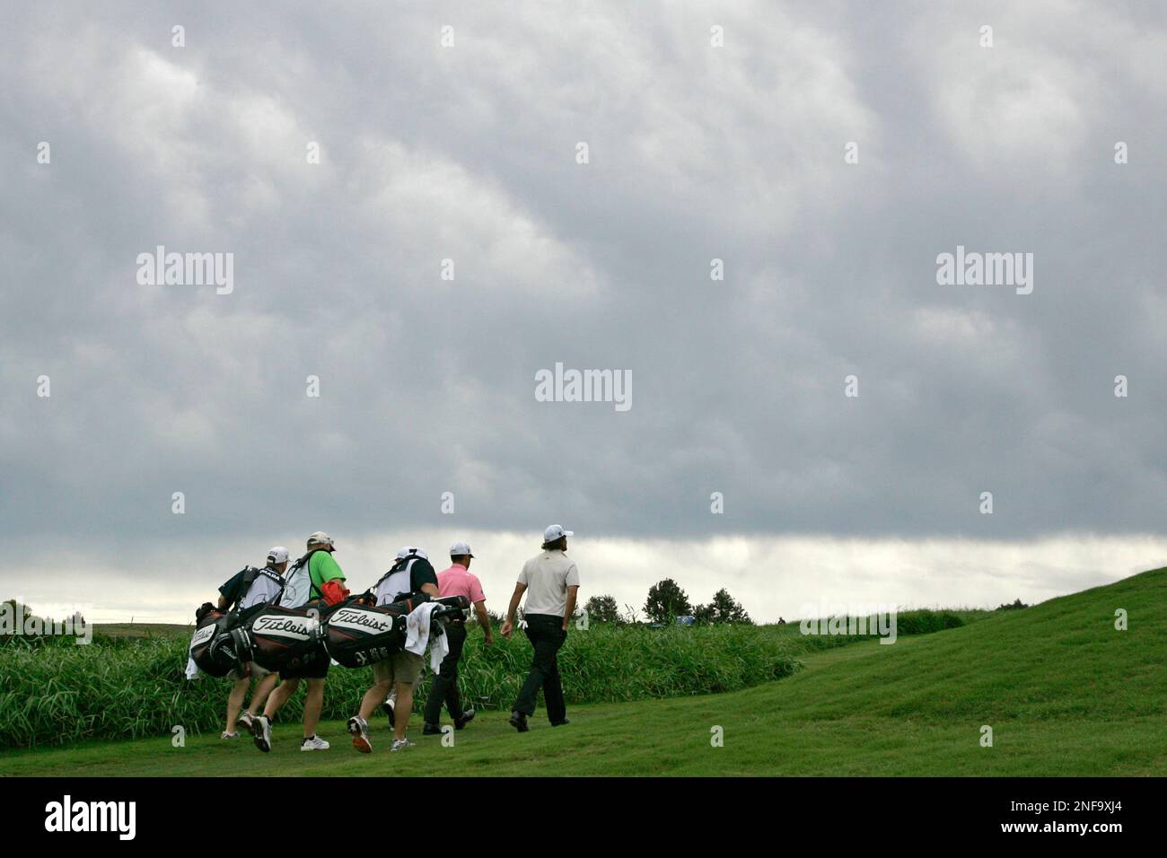Adam Scott, right, of Australia and Chez Reavie, second from right ...