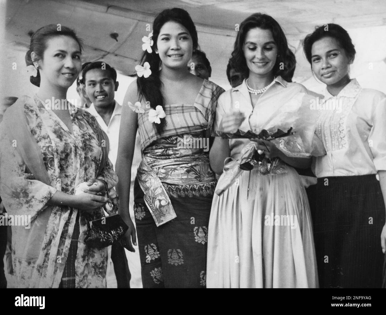 British-born actress Jean Simmons, second from right, is greeted by the ...