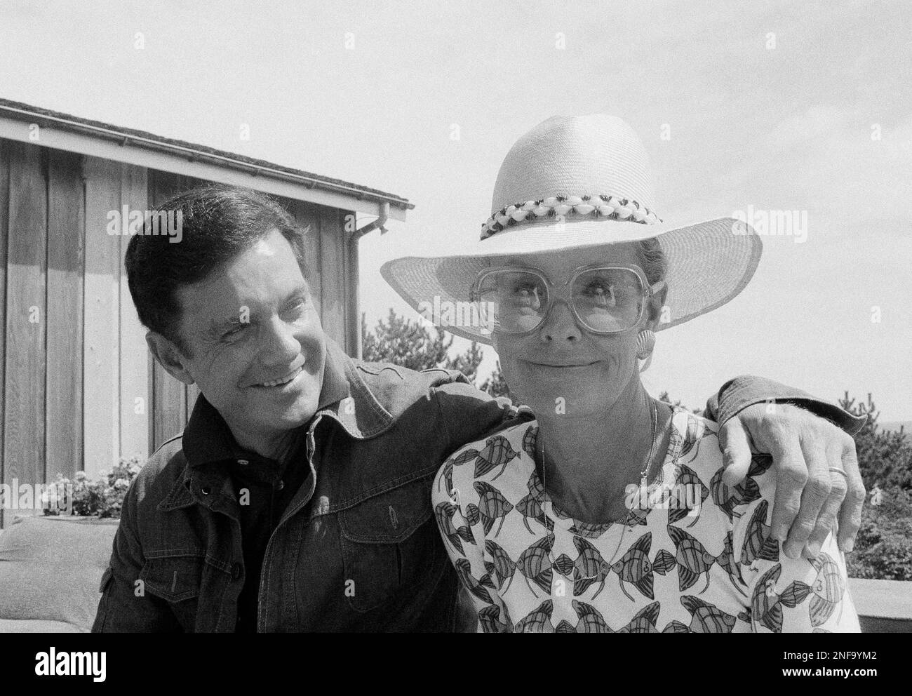 Cliff Robertson and his wife Dina Merrill are shown outside their home ...