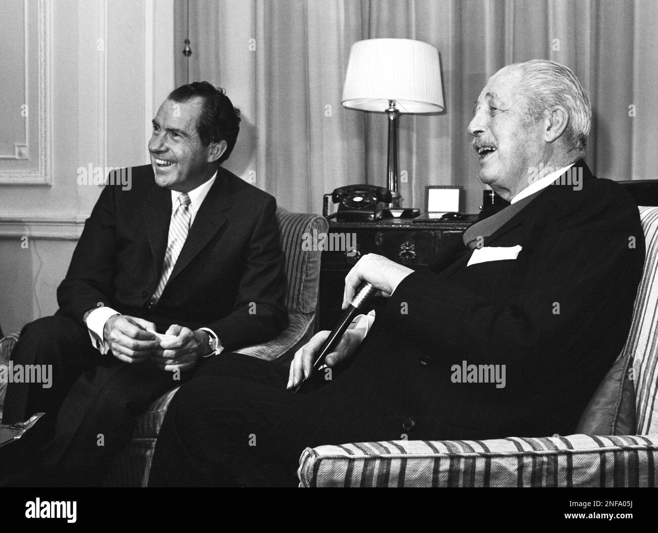 American President Richard Nixon, left, enjoys a joke with former ...