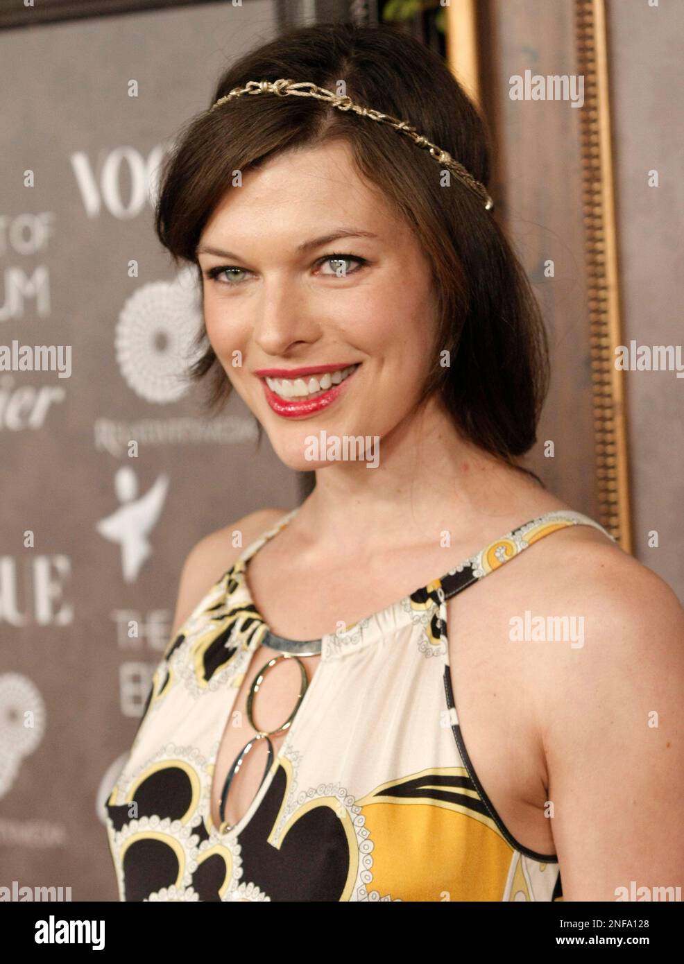 Actress Milla Jovovich poses on the press line at a benefit gala for ...