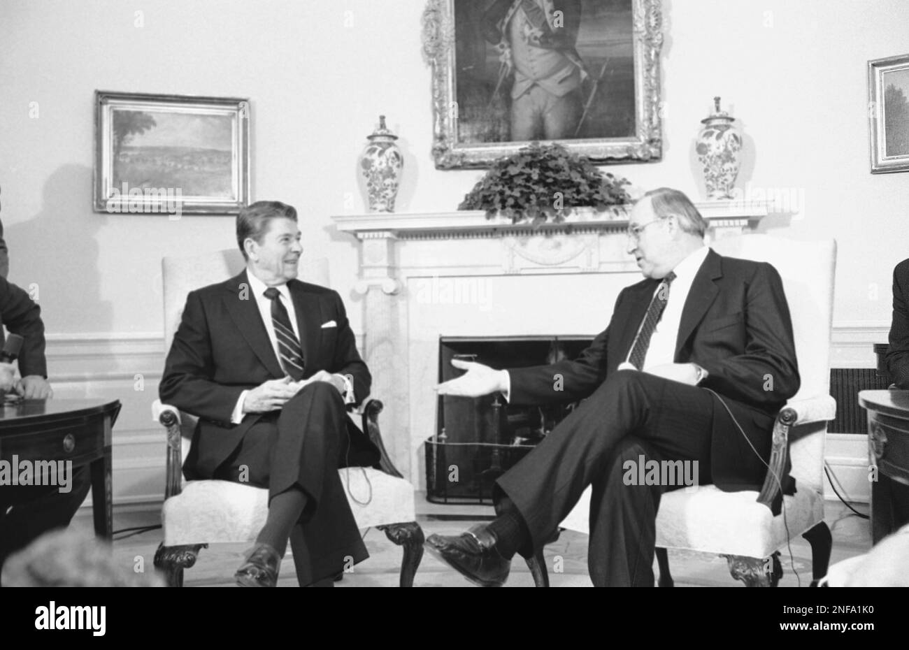 U.S. President Ronald Reagan meets in the Oval Office of the White ...