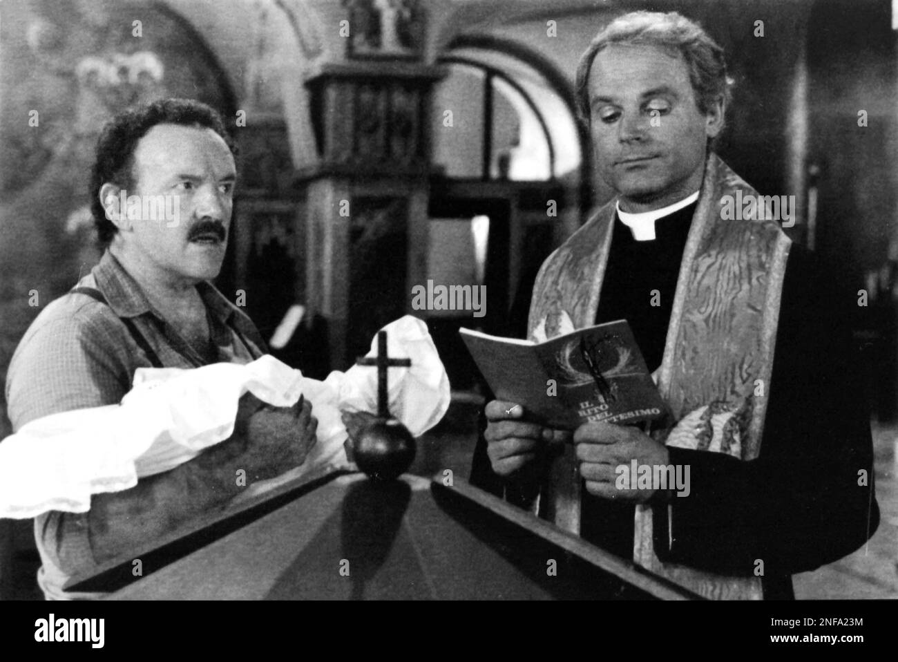 Terence Hill is shown with actor Colin Blakely (left) in a scene from the movie "Don Camillo ...