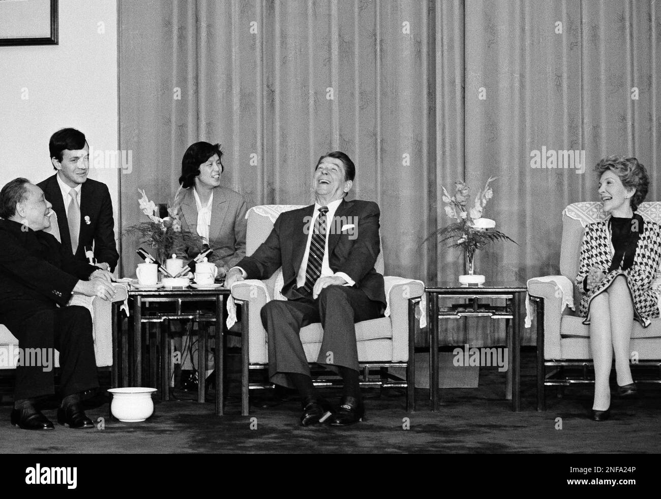 Chinese leader Deng Xiaoping and U.S. President Ronald Reagan share a laugh during their talks ...