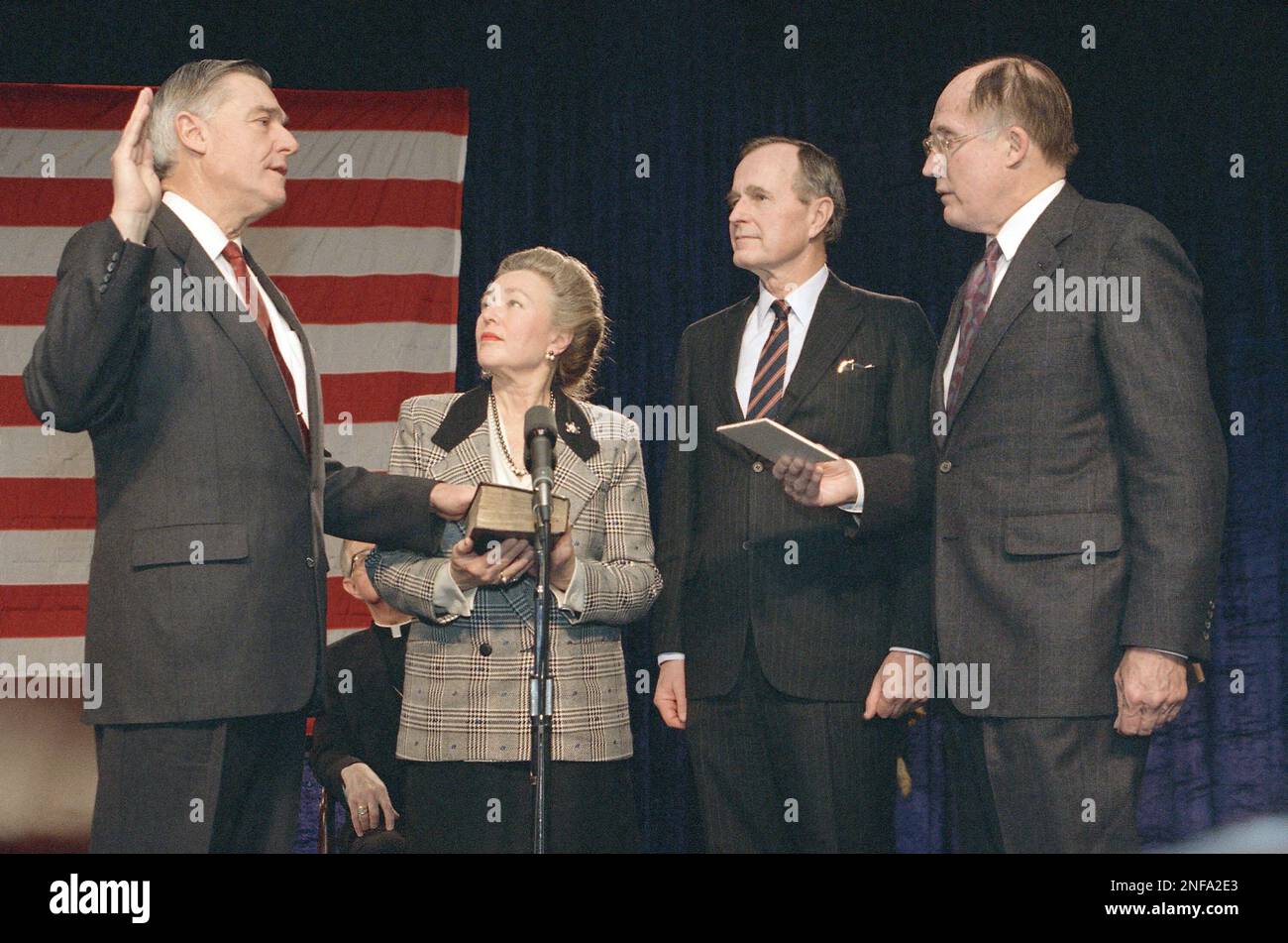 As President George Bush looks on, Energy Secretary James Watkins is ...