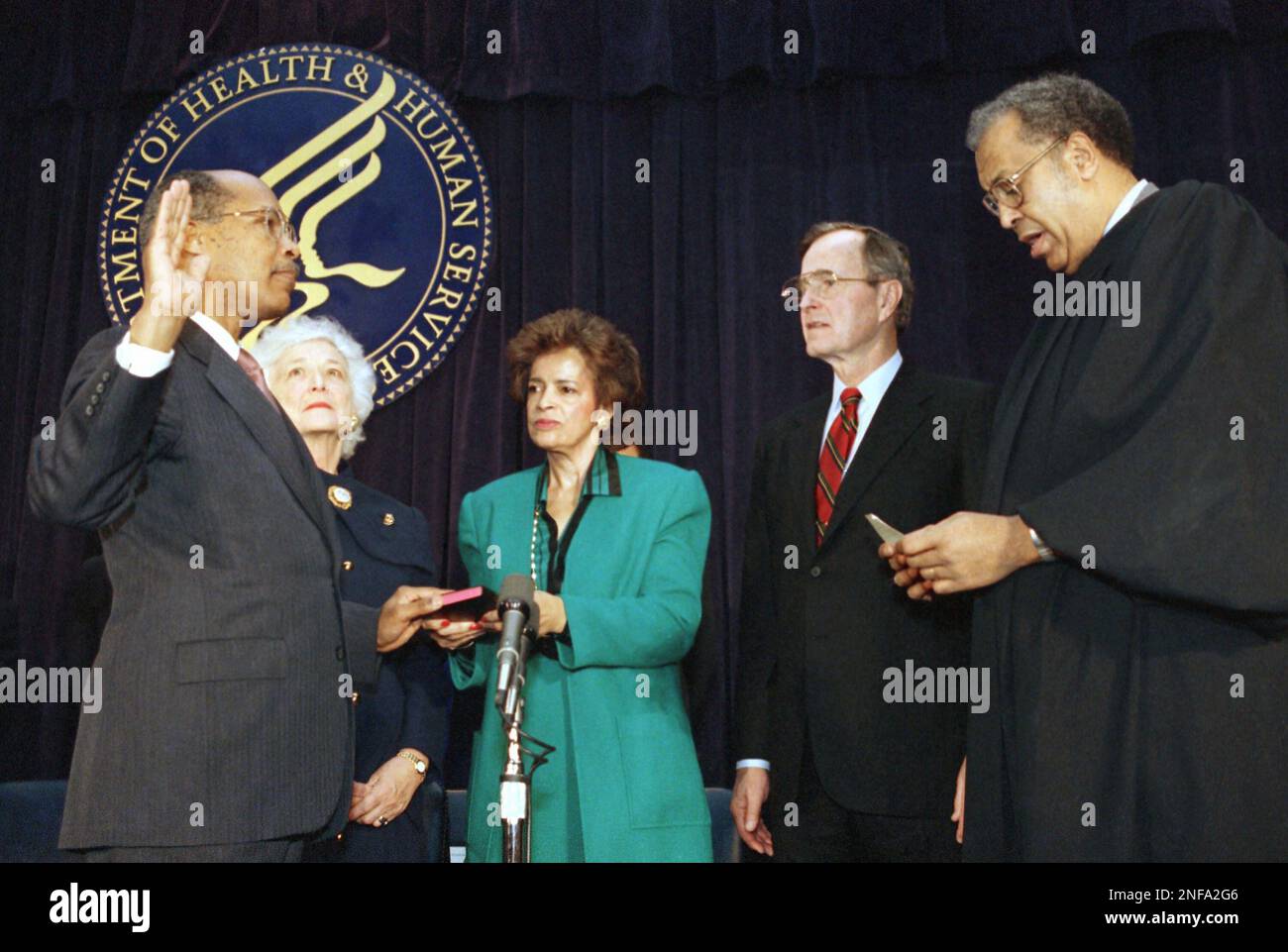 Dr. Louis Sullivan takes the oath of office as Secretary of Health and ...