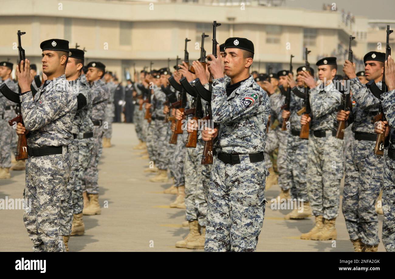 Iraqi national police stand in formation during a Police Day ceremony ...