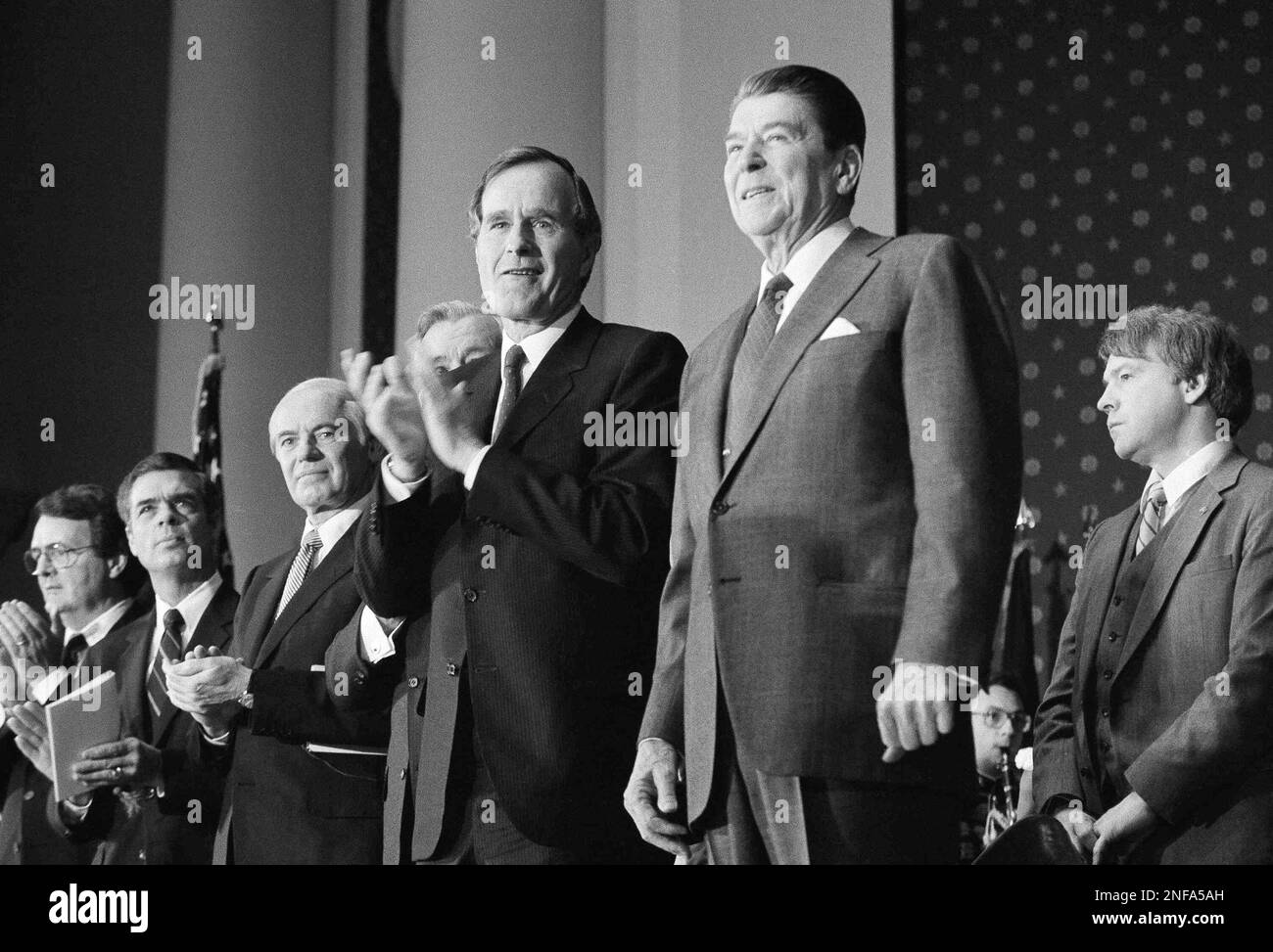 President Ronald Reagan is flanked by some of his cabinet at D.A.R ...