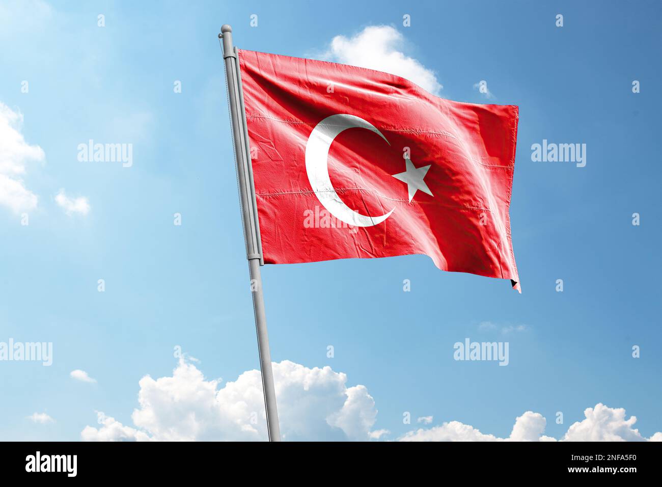 3d Illustration of Flag of Turkey waving in the wind against a blue sky ...