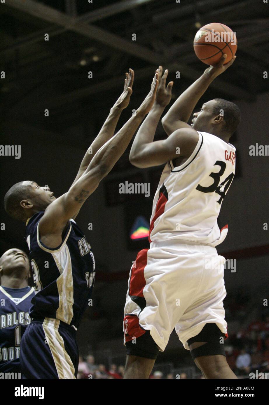 Cincinnati forward Yancy Gates (34) shoots against Charleston Southern ...