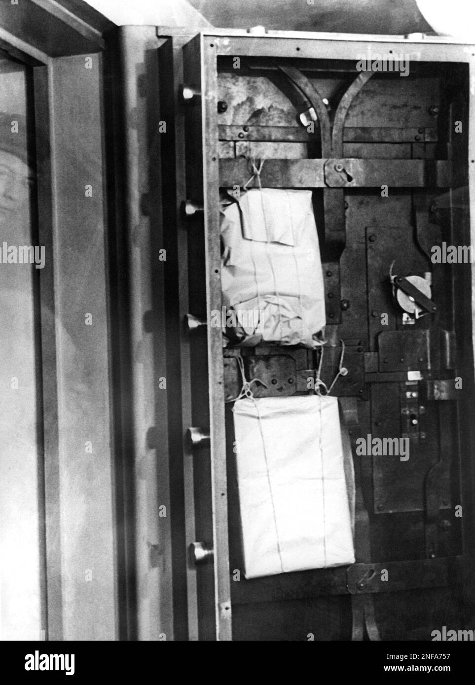 German officials uncovered this contraption which, if the safe's door ...