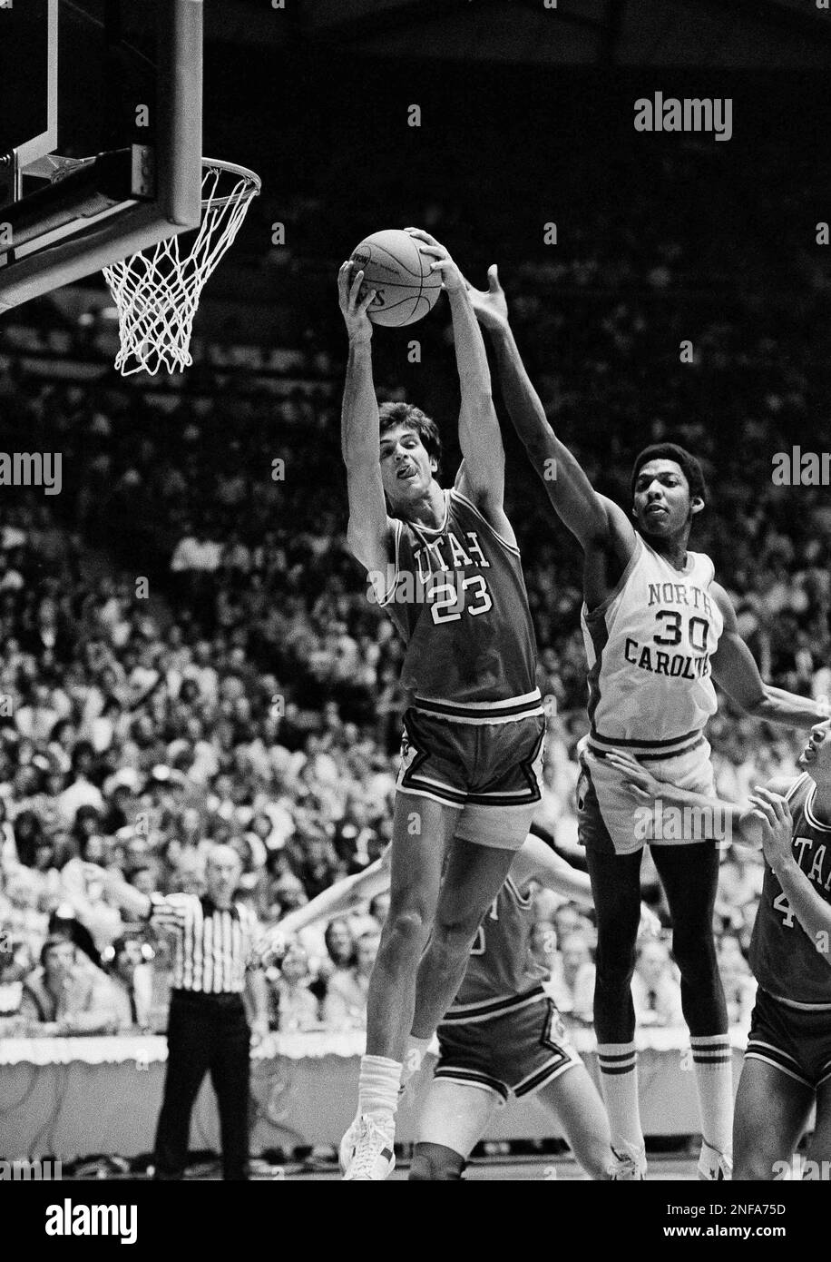 Utah's Danny Vranes (23), gets the rebound from North Carolina's Al ...