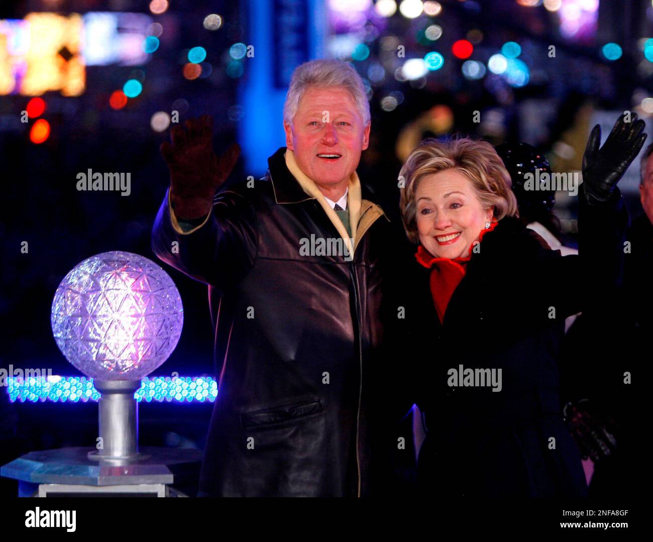 Sen. Hillary Clinton and former President Bill Clinton wave to the ...