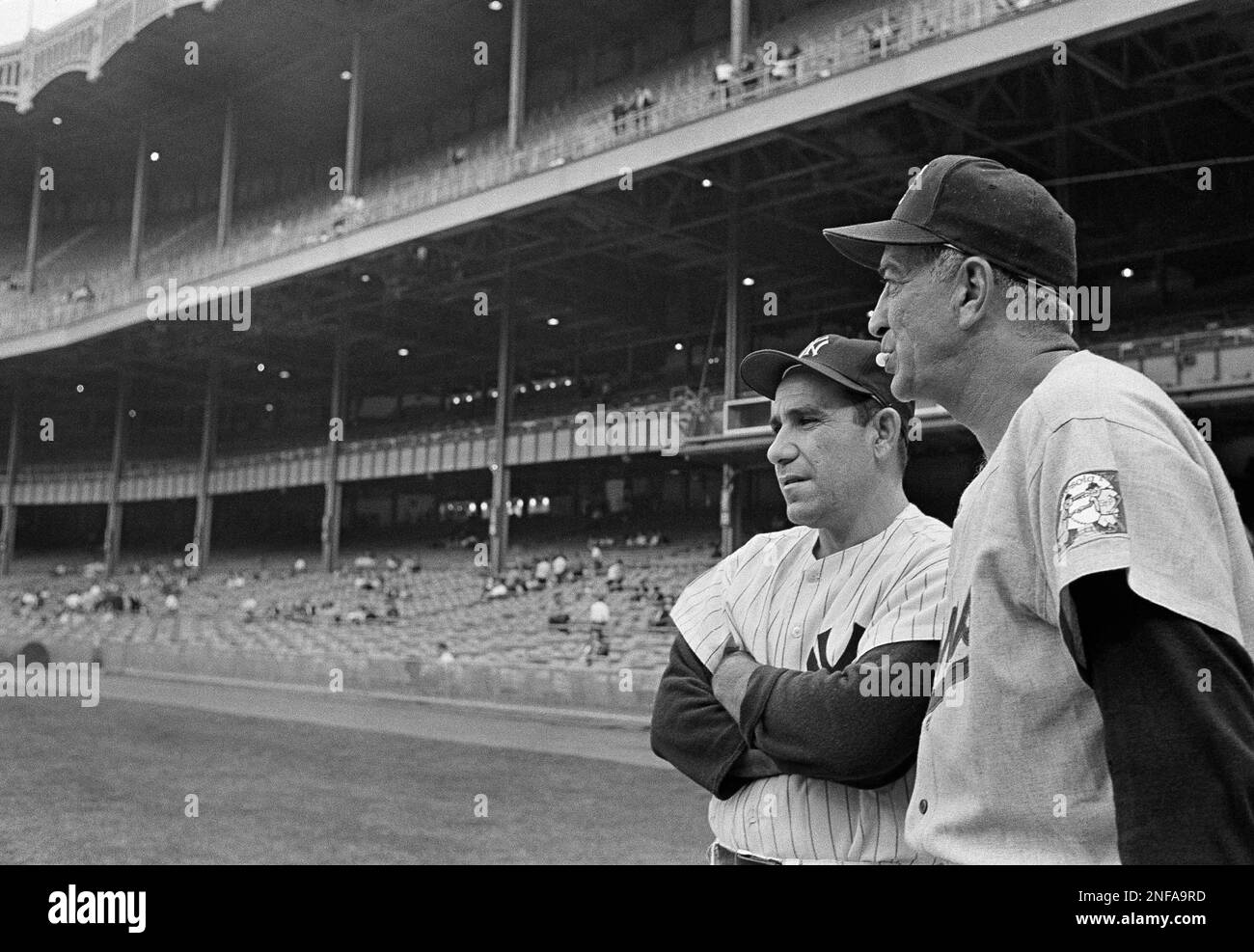 Yankee skipper Yogi Berra, left, and Sam Mele, manager of the Minnesota ...