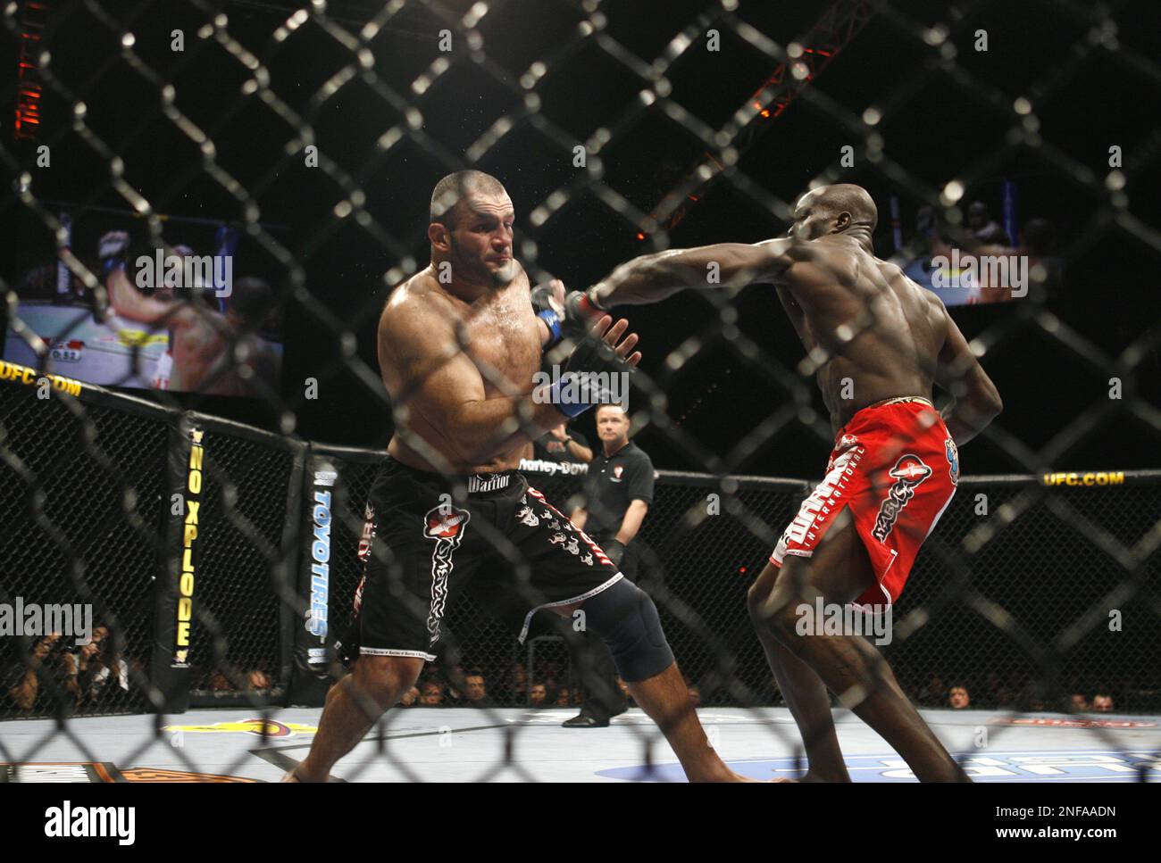 Cheick Kongo, right, fights Mostapha Al Turk during their UFC ...