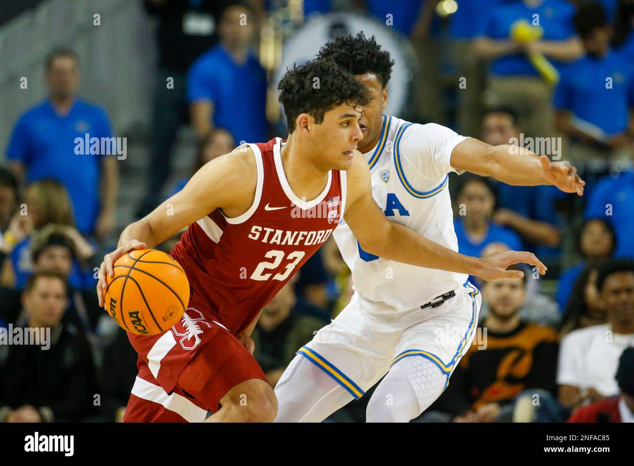 Stanford forward Brandon Angel (23) drives past UCLA guard Jaylen Clark ...
