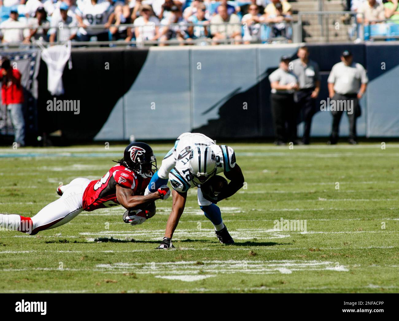 Carolina Panthers wide receiver D.J. Hackett (18) is tackled by the ...