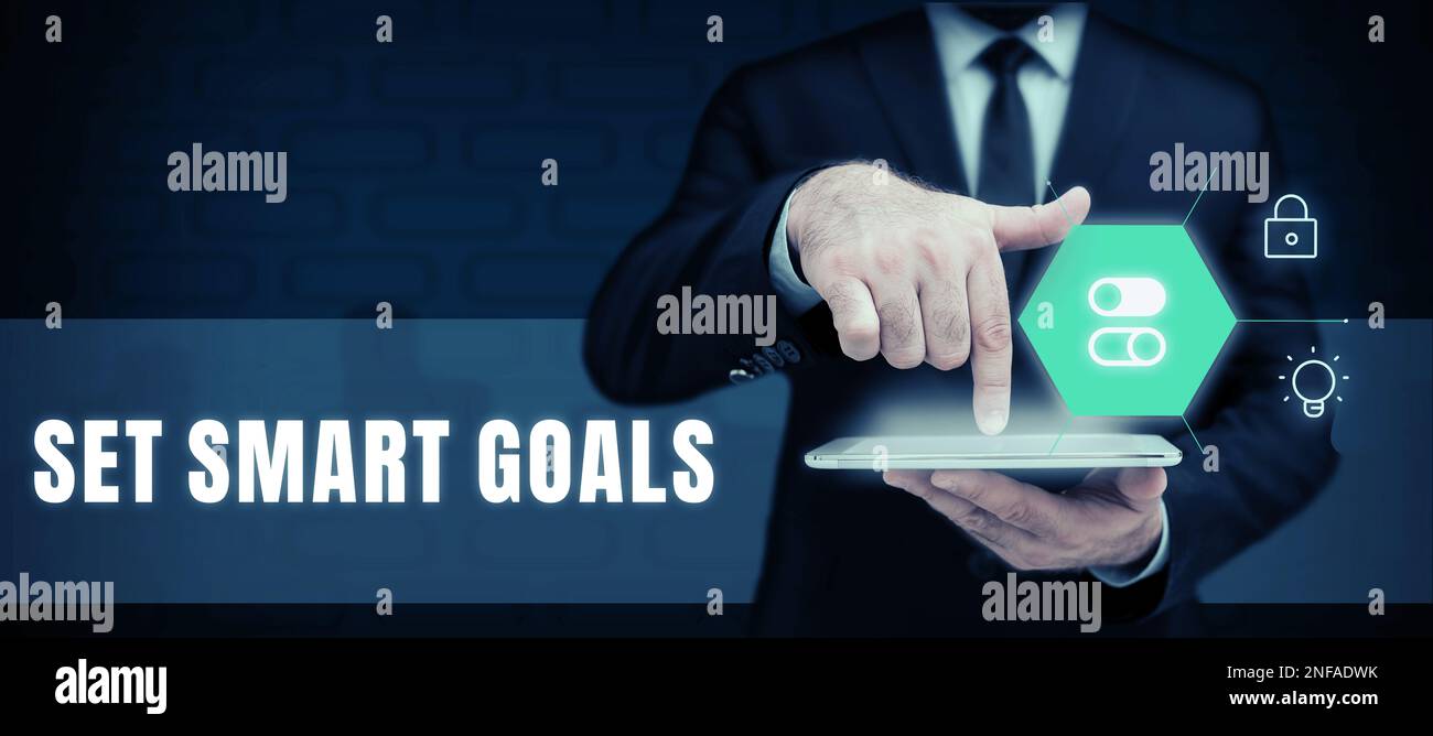 Hand writing sign Set Smart Goals, Business concept Establish ...