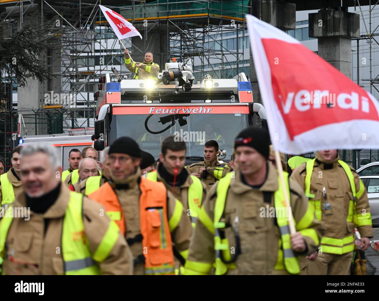 17 February 2023, Hesse, Frankfurt/Main: Employees of the airport fire ...
