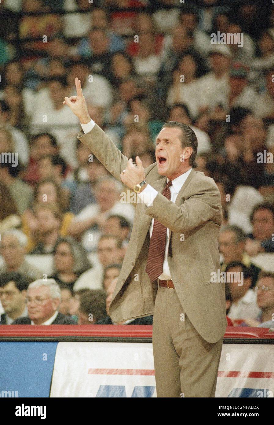 Pat Riley coach of the New York Knicks directs his team during the ...