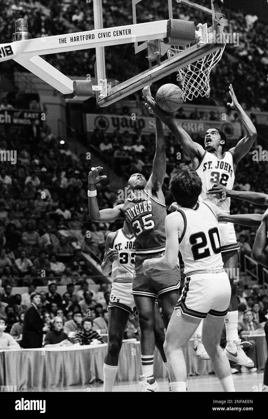 Trevor Jackson of St. John’s University (32) and Clarence Tillman of ...