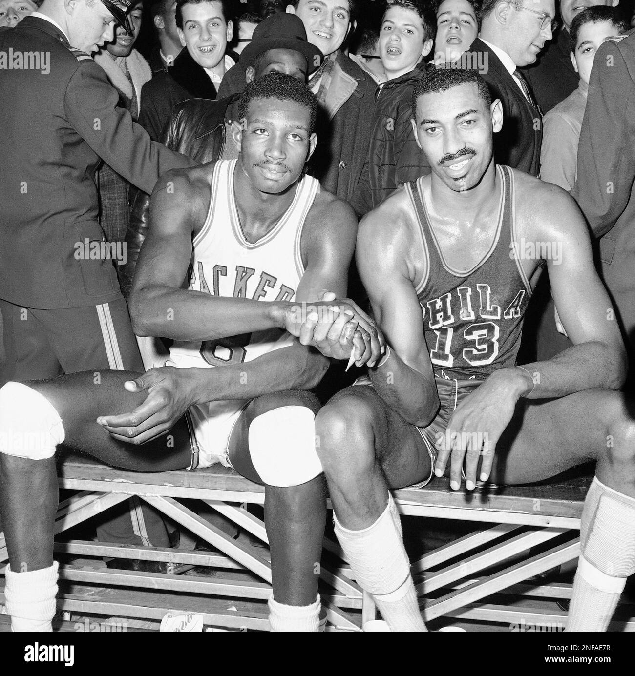 Wilt Chamberlain, right, star basketball player for the Philadelphia ...