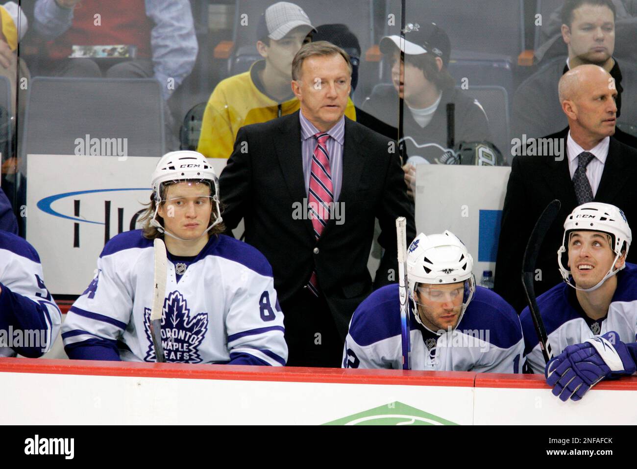 Toronto Maple Leafs coach Ron Wilson, center, coaches against the ...