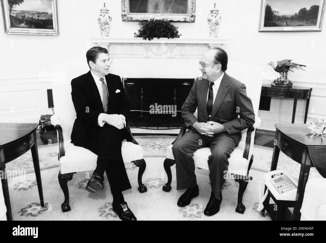In this photo provided by the White House, President Ronald Reagan ...