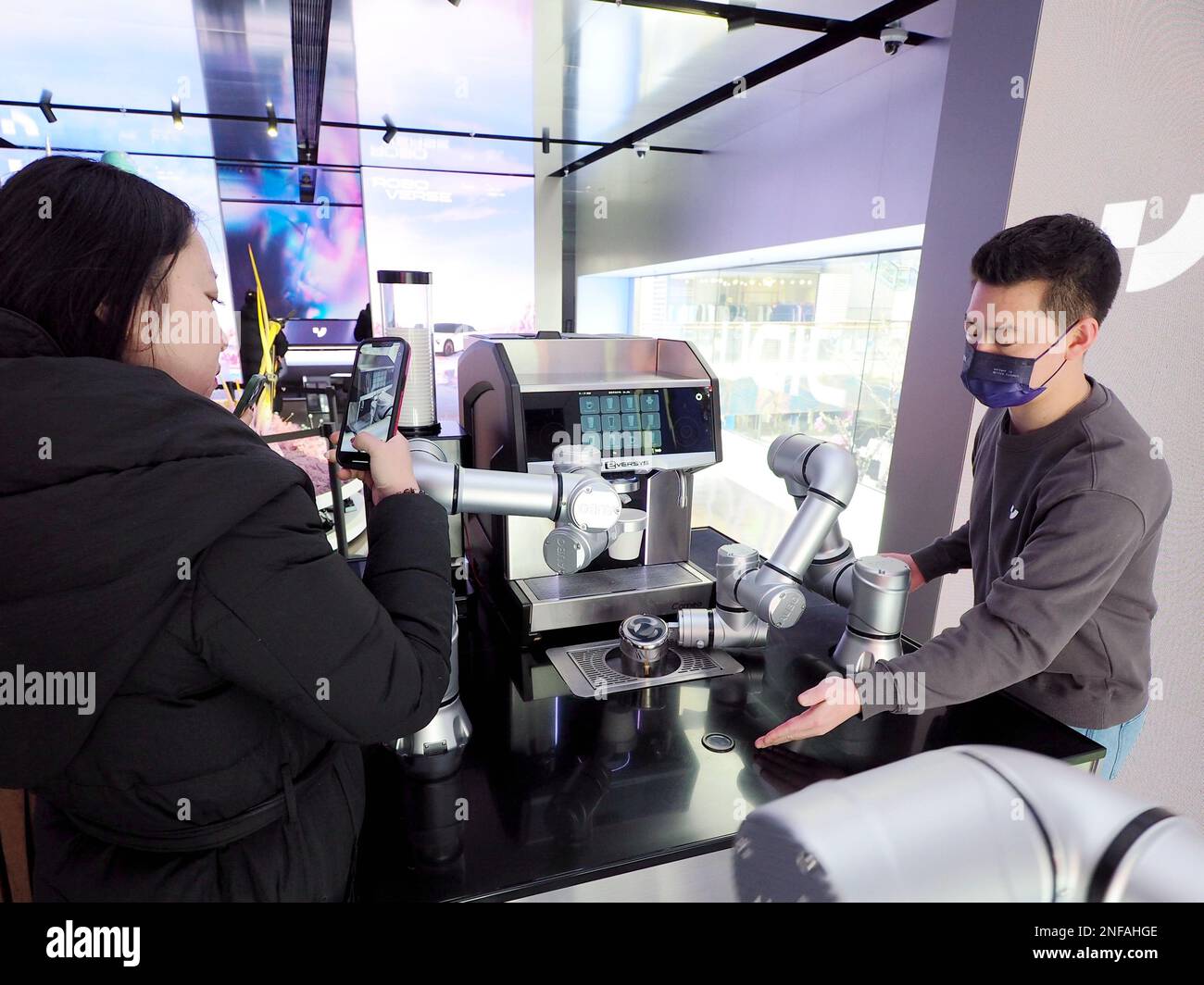 BEIJING, CHINA - FEBRUARY 17, 2023 - Visitors watch an intelligent ...