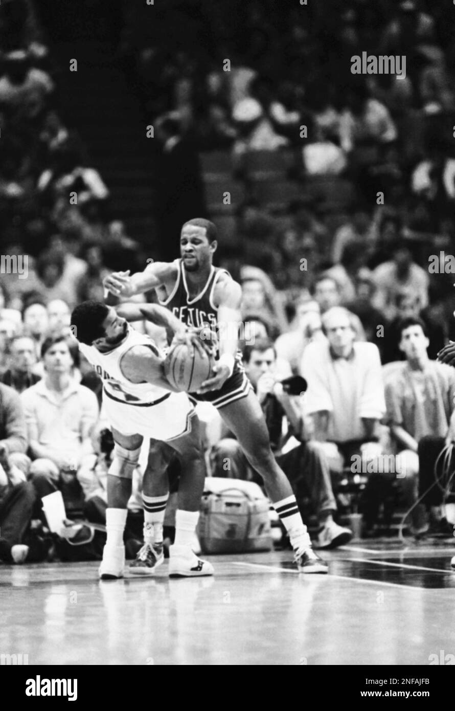 Philadelphia 76ers' Clint Richardson falls over backwards under ...