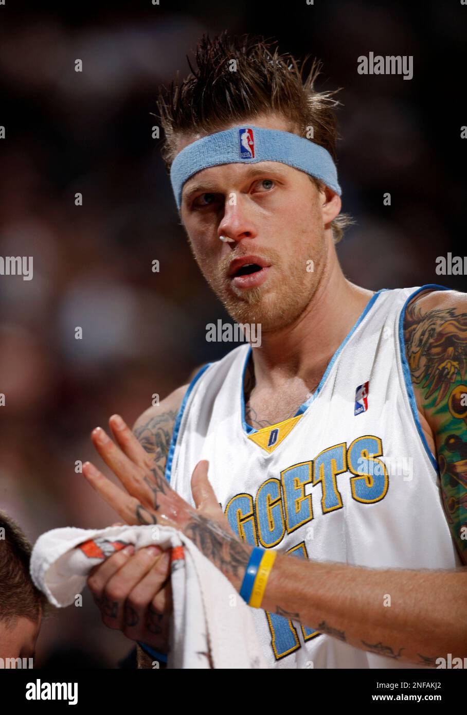 Denver Nuggets forward Chris Andersen looks on while facing the ...