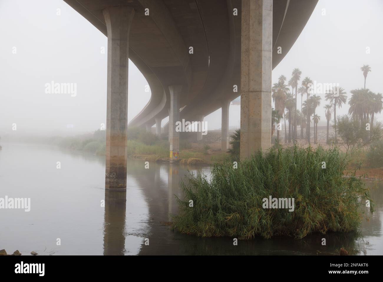 Colorado River bridge at Yuma Az in fog Stock Photo - Alamy
